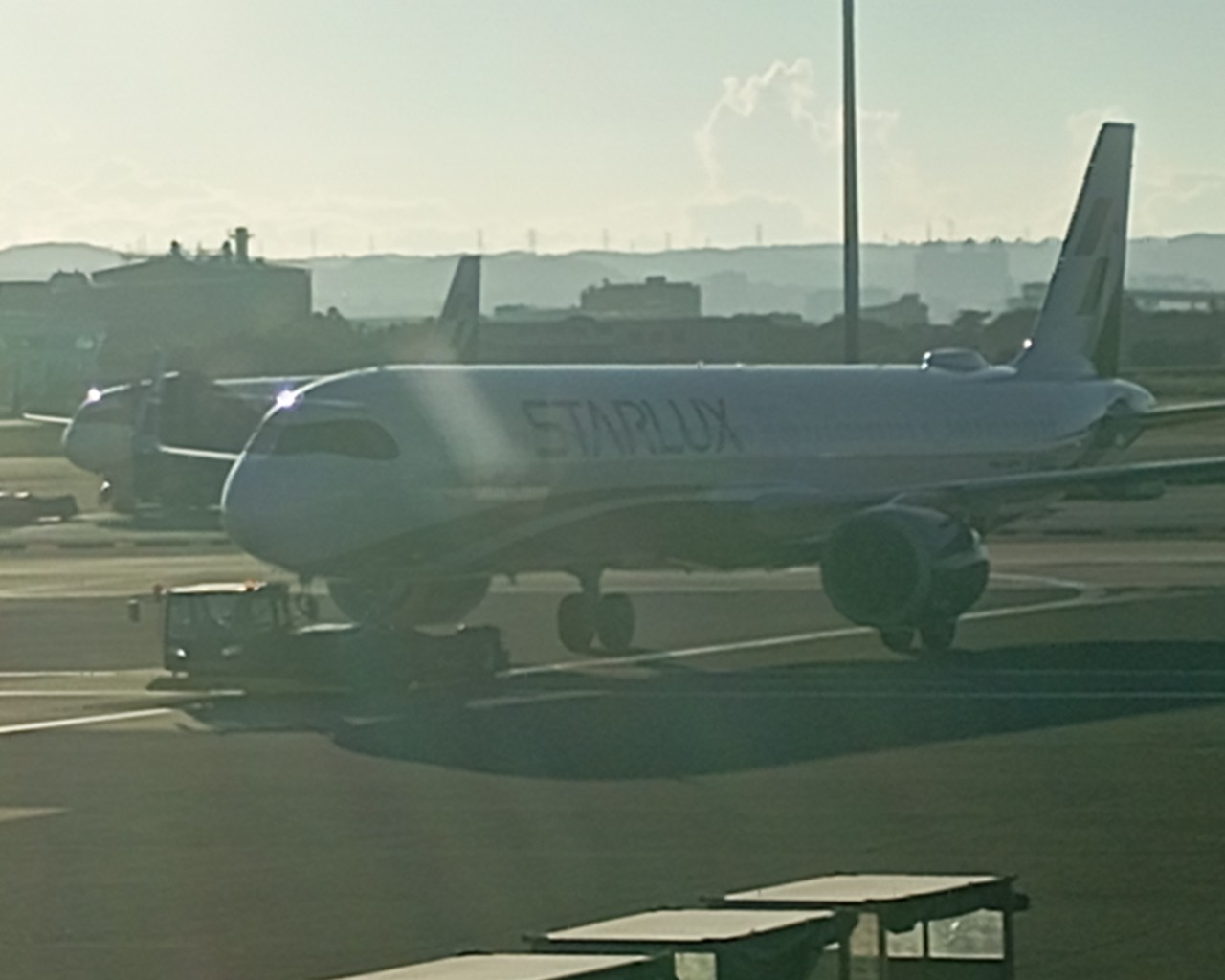 Review of Starlux Airlines flight from Taipei to Hong Kong in Economy